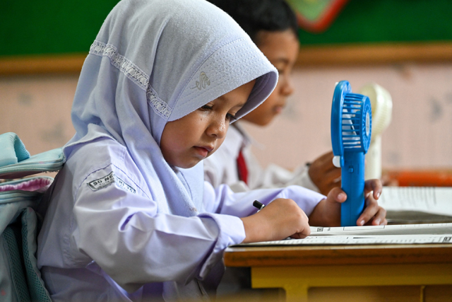 Longer Summers, Hotter Classrooms, Poorer Kids | Council on Foreign ...